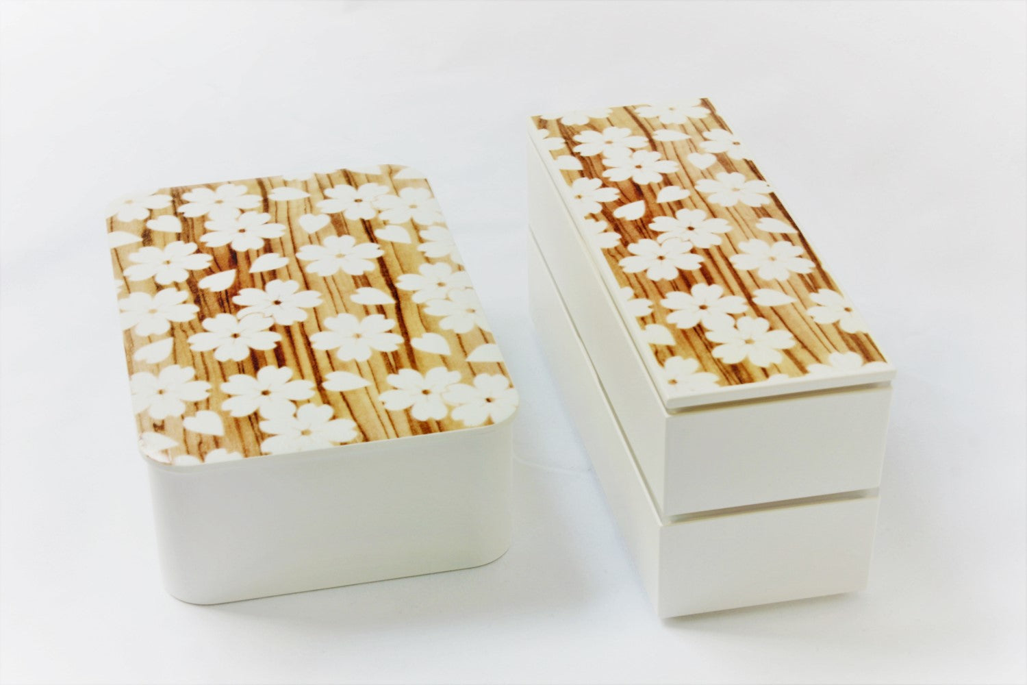 Sakura and wood tone bento boxes | Beautiful Japanese design