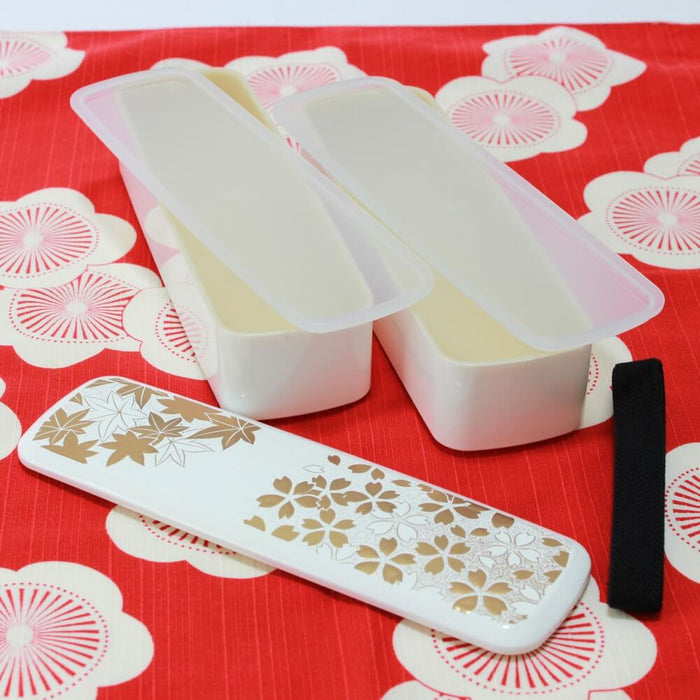 Slim white Japanese bento box with Makie patterns | 2 tiers