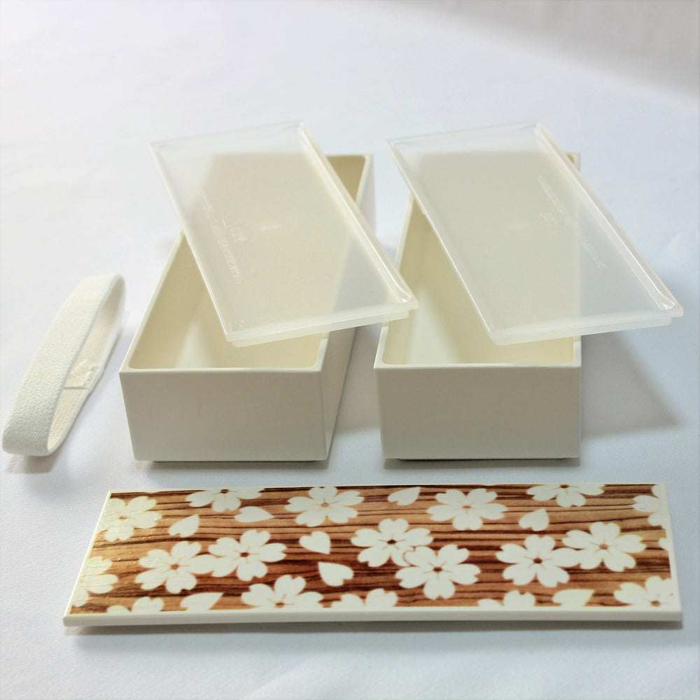 Sakura and wood tone bento boxes | Beautiful Japanese design